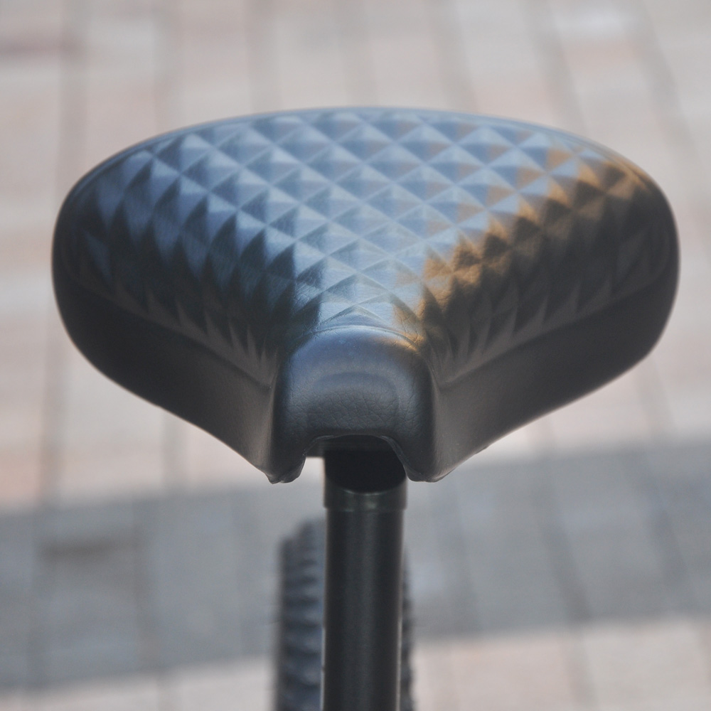 Diamond-shaped leather bicycle seat